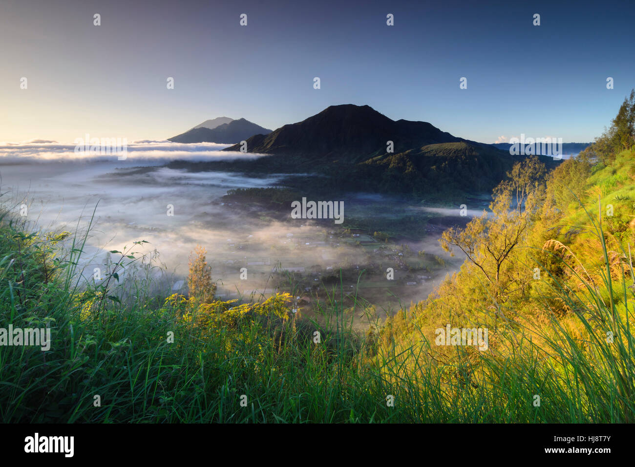 Pinggan village and mount Batur, Bali, Indonesia Stock Photo - Alamy