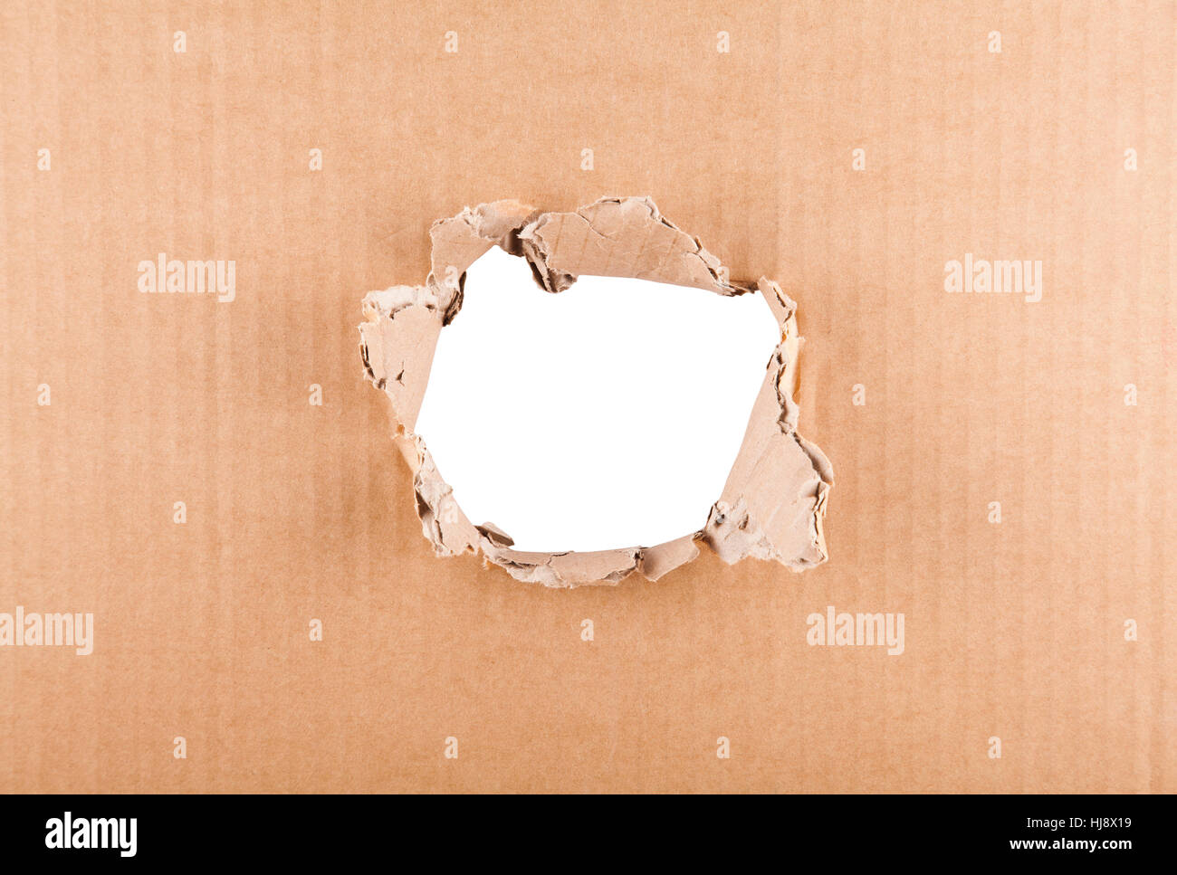 Ripped hole in cardboard on white background with clipping path Stock ...