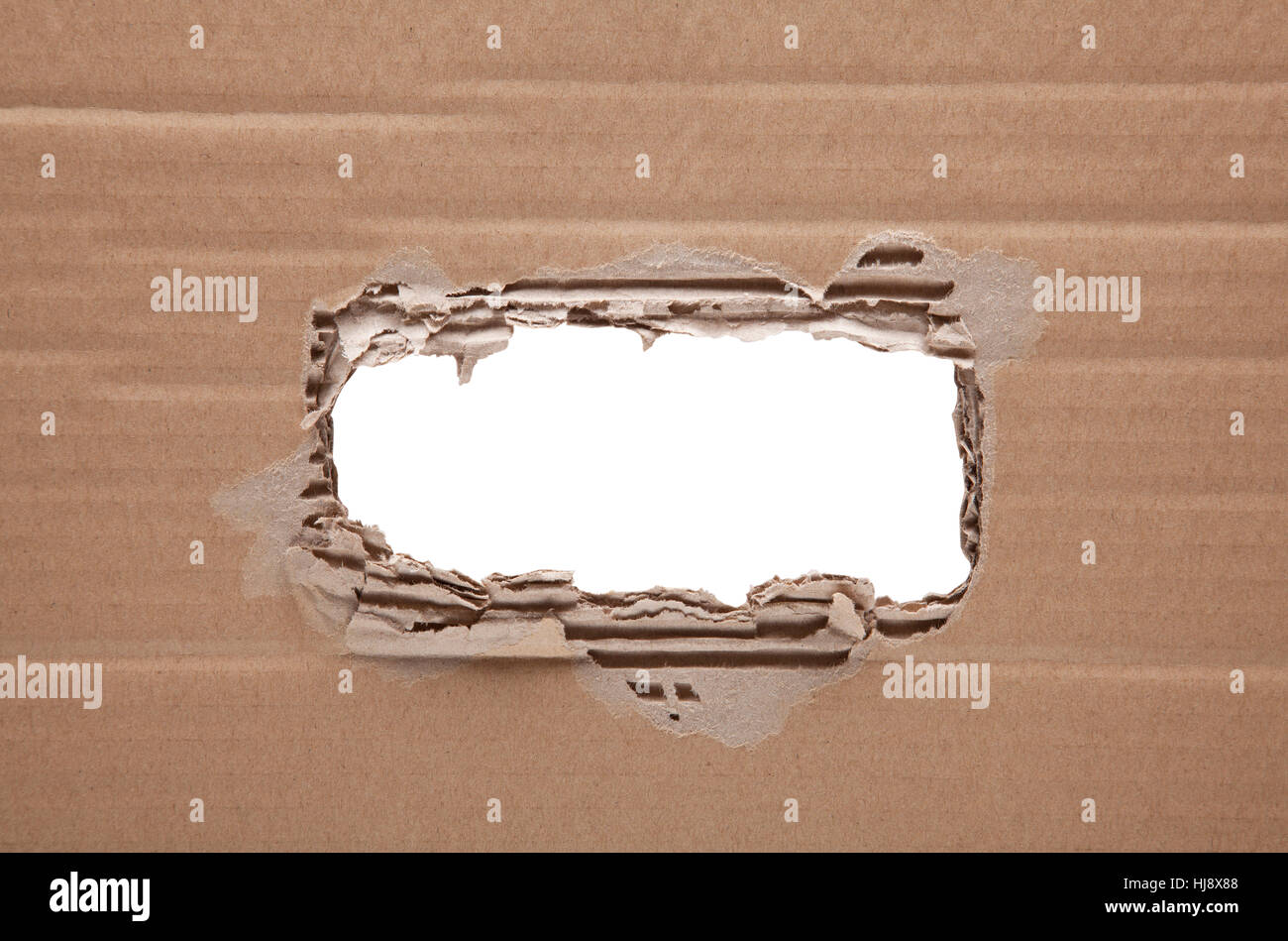 Ripped hole in cardboard on white background with clipping path Stock ...