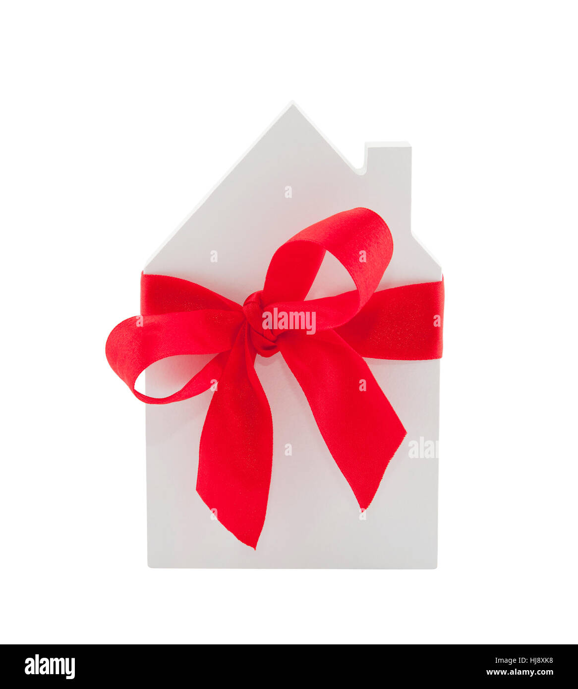 House with red ribbon isolated on white background with clipping path ...