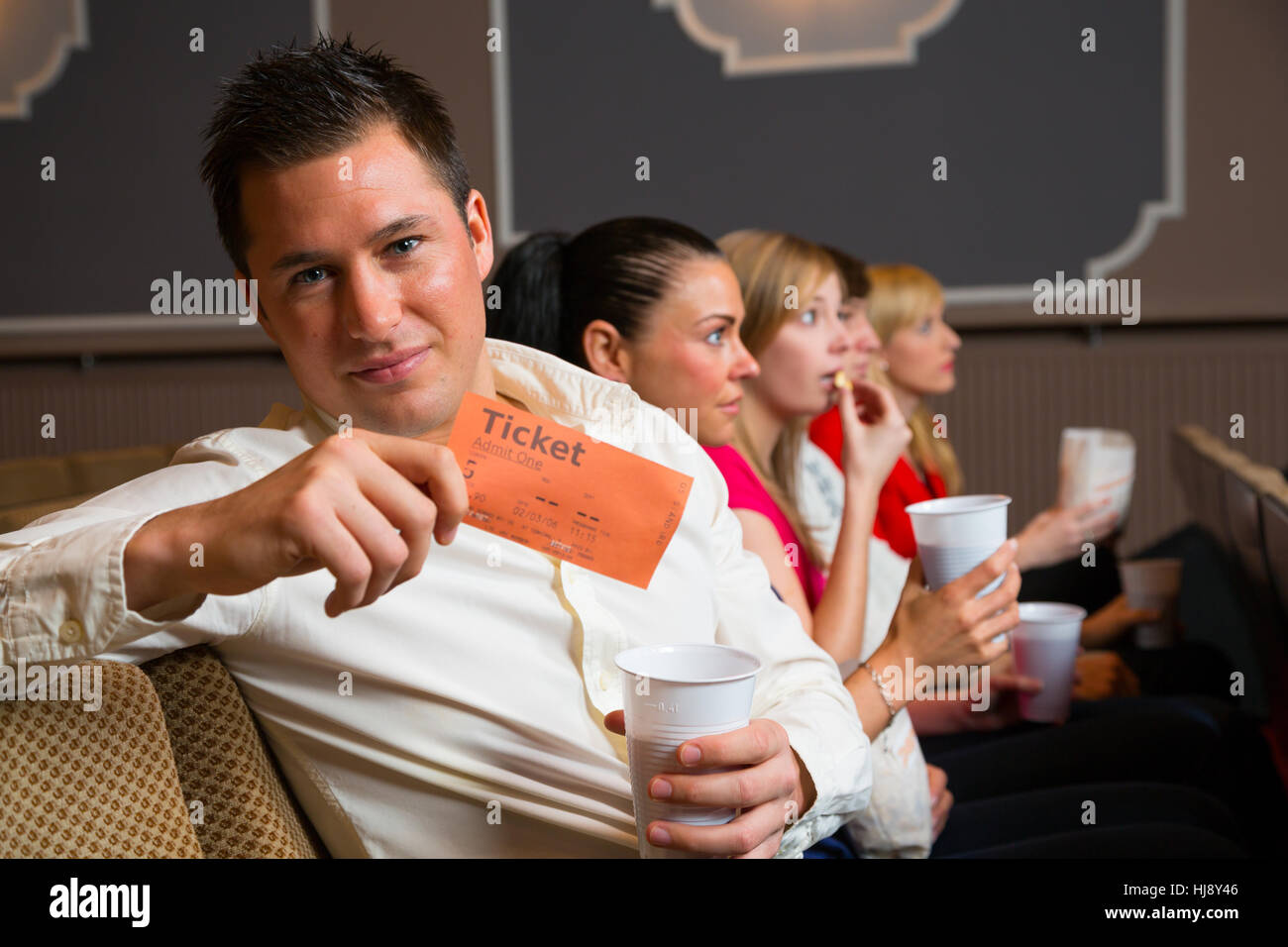 man presenting ticket Stock Photo - Alamy