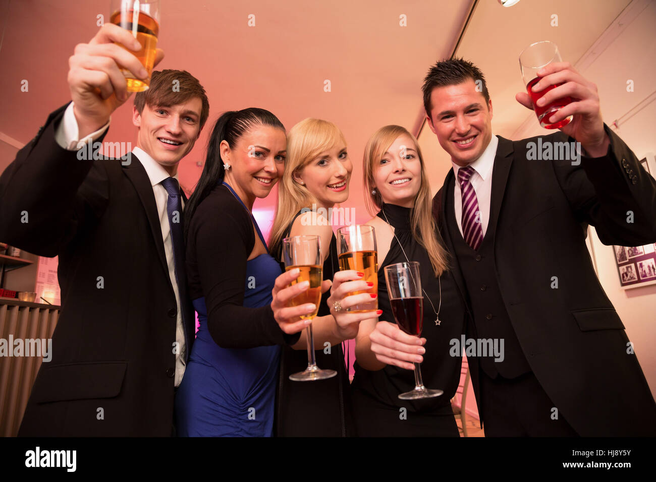 friends celebrate together in a pub Stock Photo - Alamy