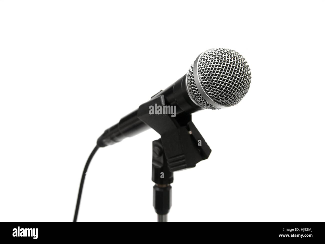Dynamic microphone on a stand isolated on white Stock Photo - Alamy