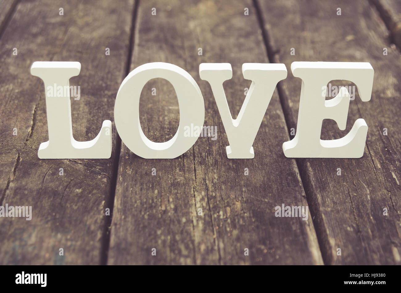 Valentines Day background. Love text on wooden background Stock Photo ...