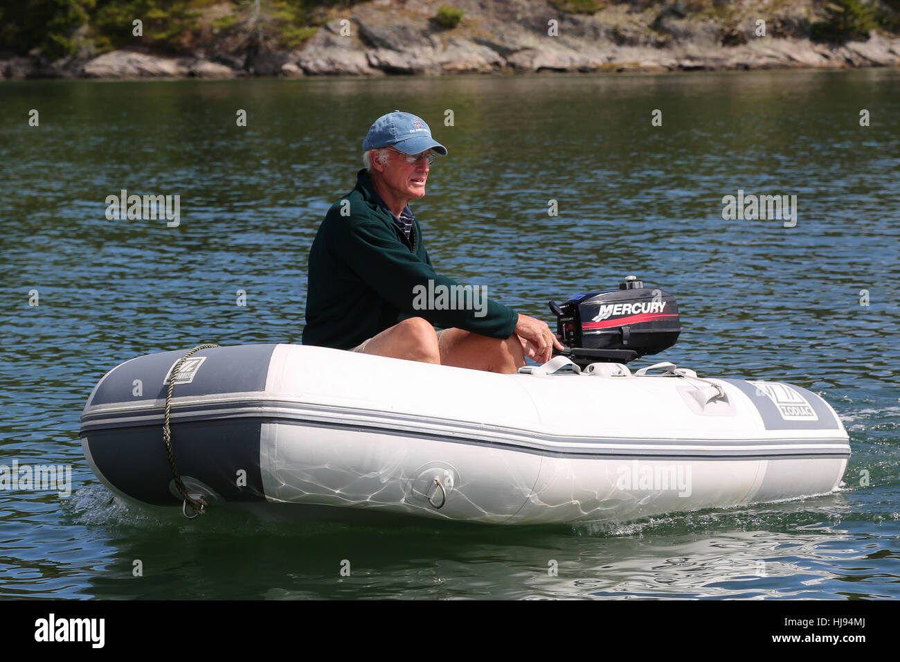 Inflatable dinghy outboard motor hi-res stock photography and images ...