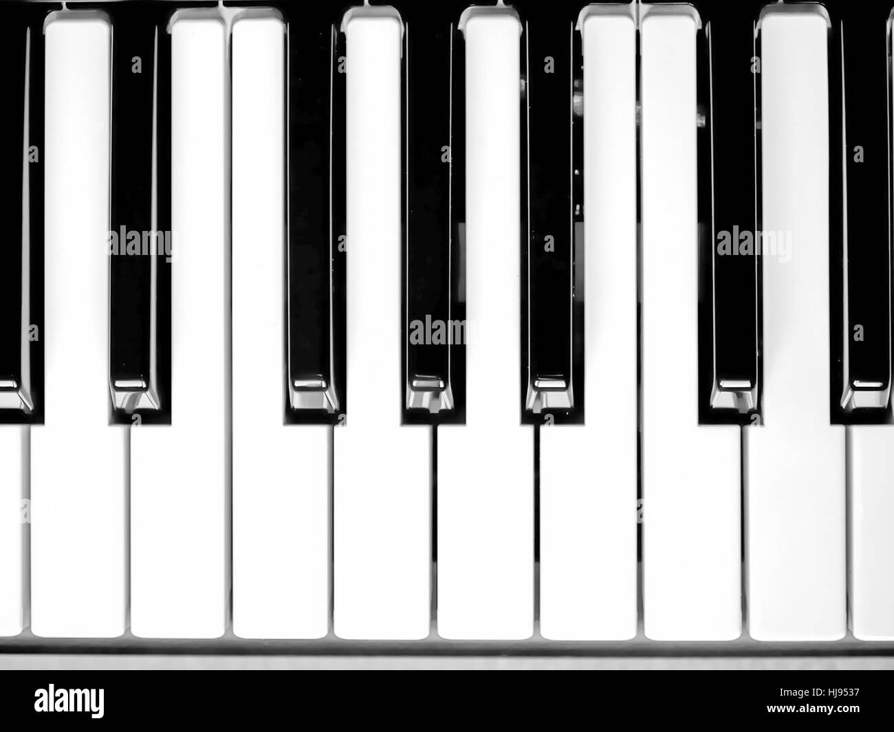 Detail of black and white keys on music keyboard Stock Photo - Alamy