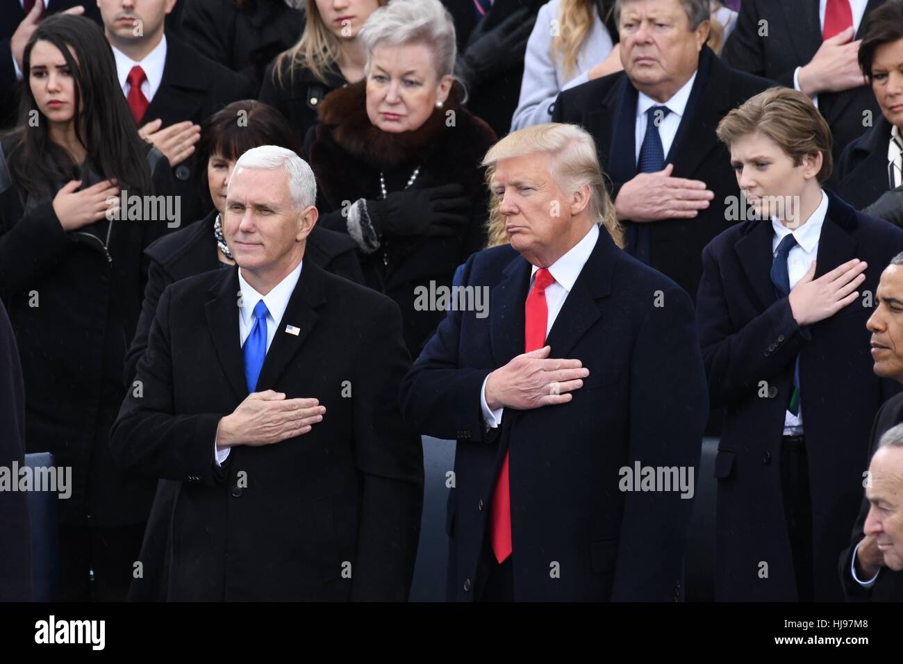President Donald Trump and Vice President Mike Pence stand for the ...