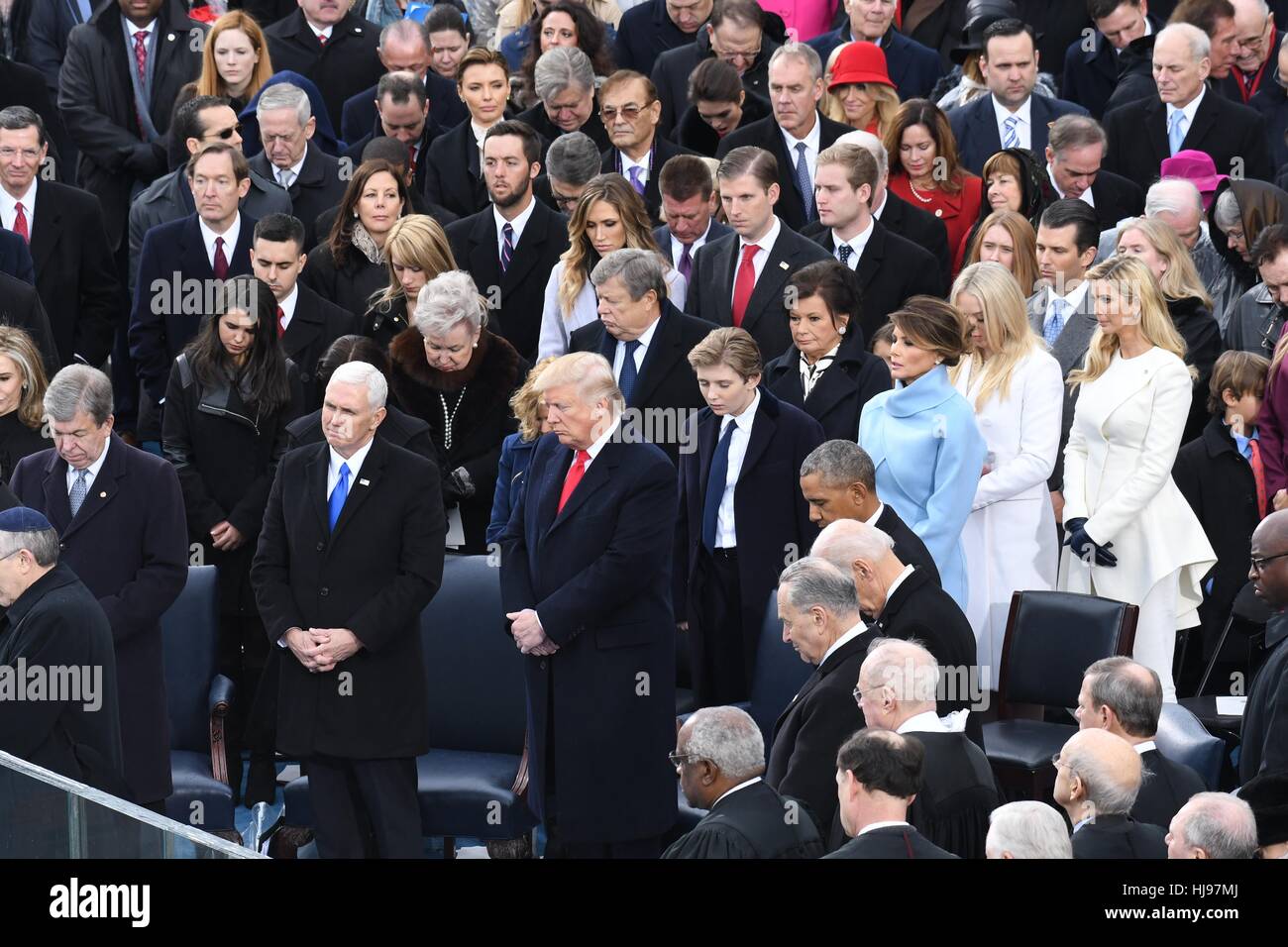 President Donald Trump and Vice President Mike Pence stand for a prayer ...