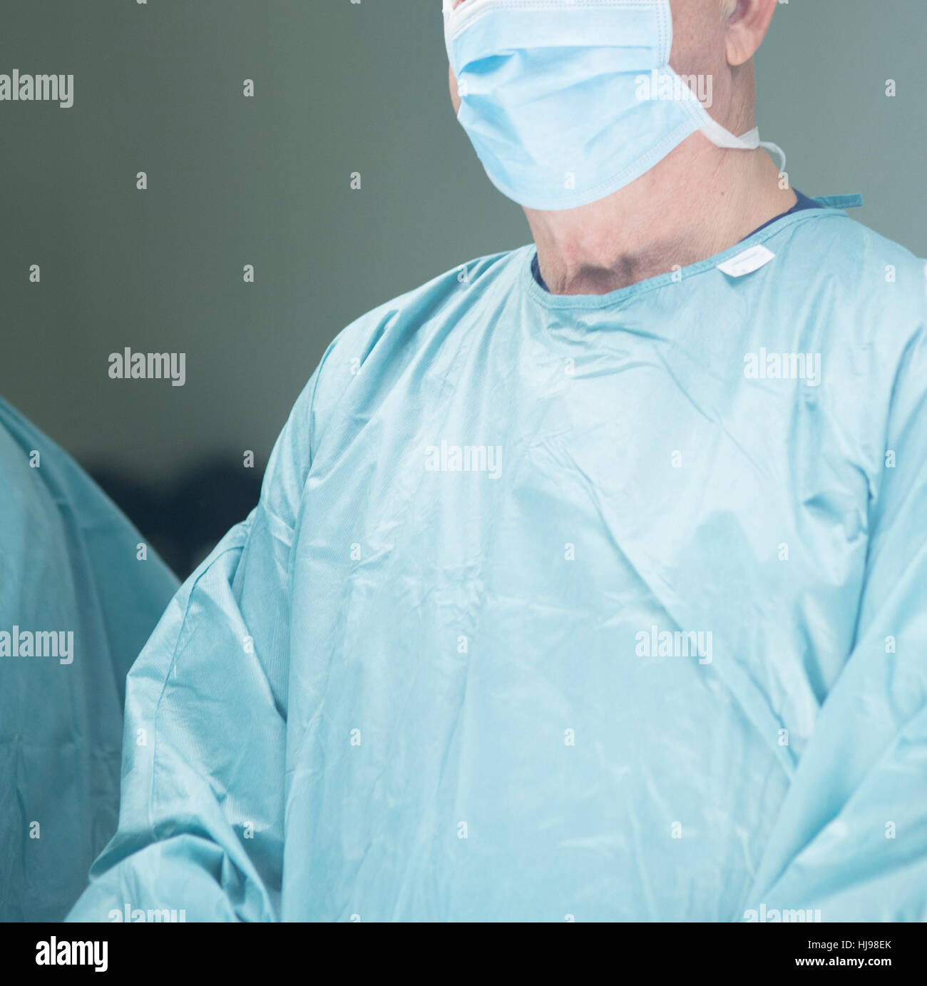 Surgeon in hospital surgery in sterile uniform "scrubs" in operating ...