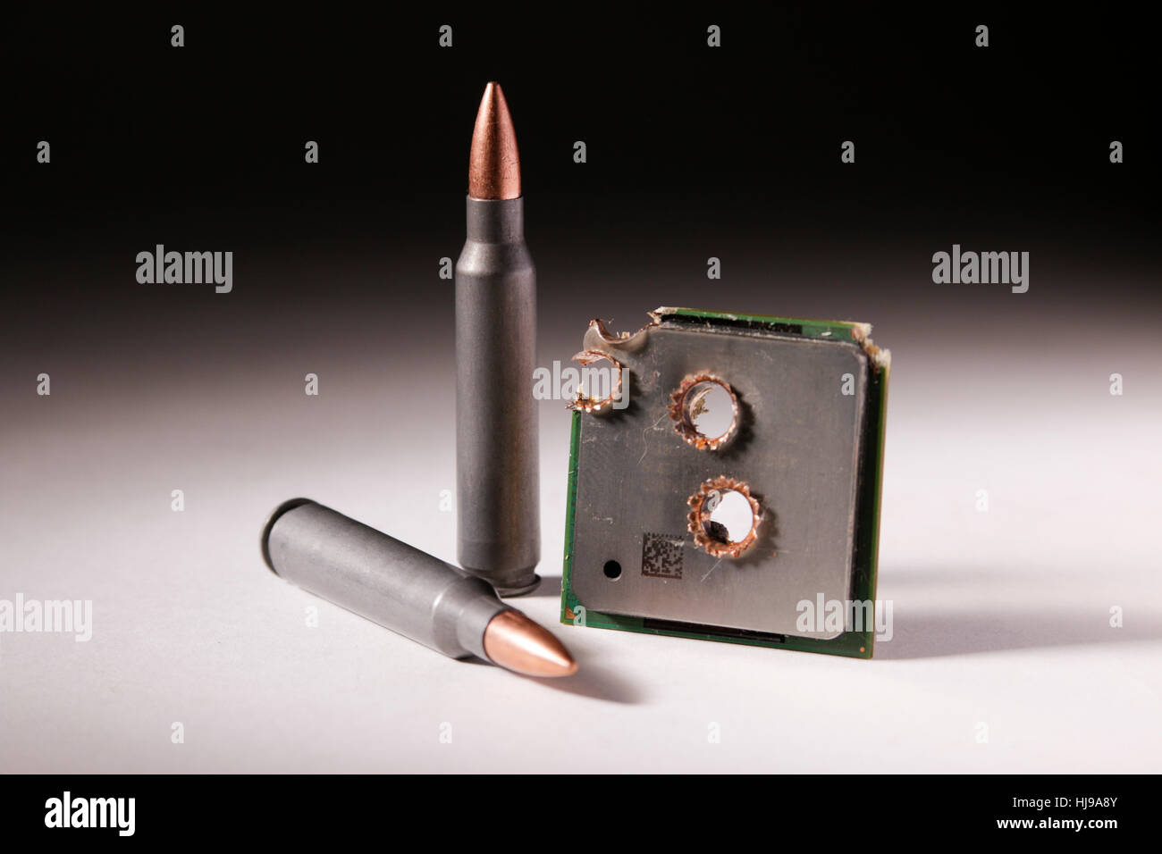 Intel i7 Processor with bullet holes and bullets Stock Photo - Alamy