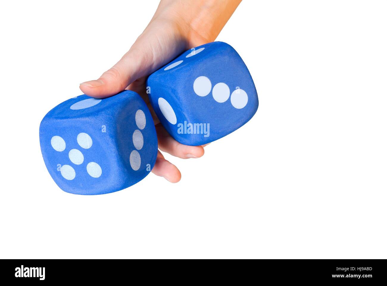 hand in throwing the dice gesture with big blue dice, on white Stock ...
