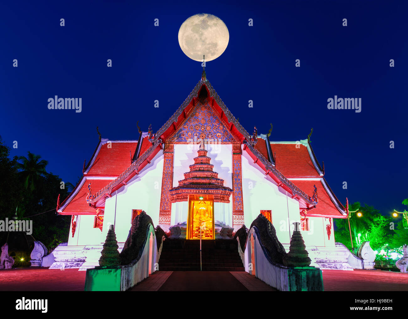 Moon on night sky over Wat Phumin temple at Nan, Thailand Stock Photo ...