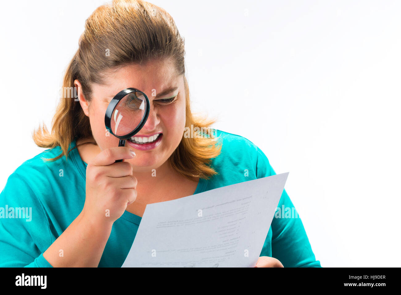 woman looks through magnifier magnifying glass Stock Photo - Alamy