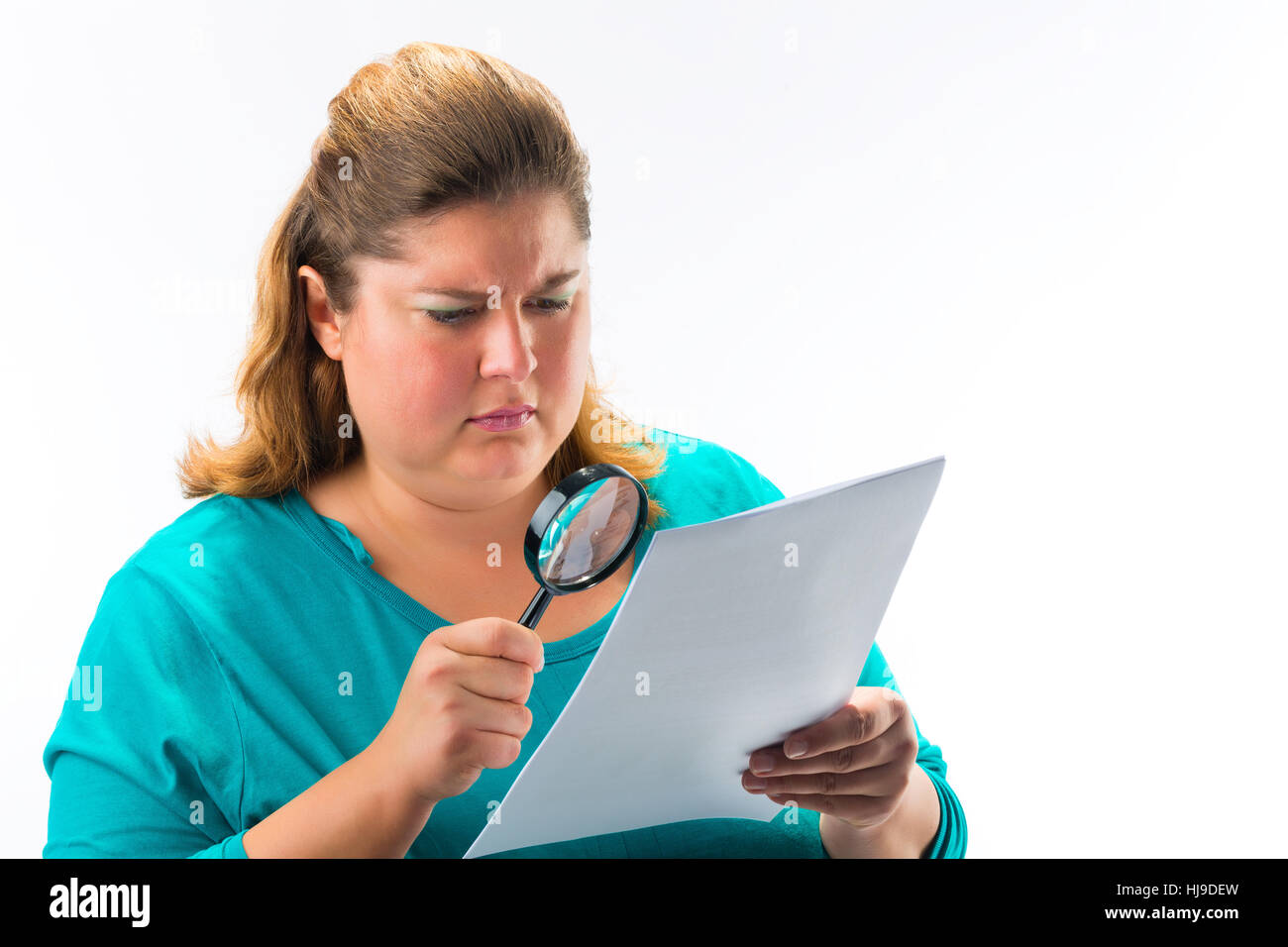 woman looks through magnifier magnifying glass Stock Photo - Alamy
