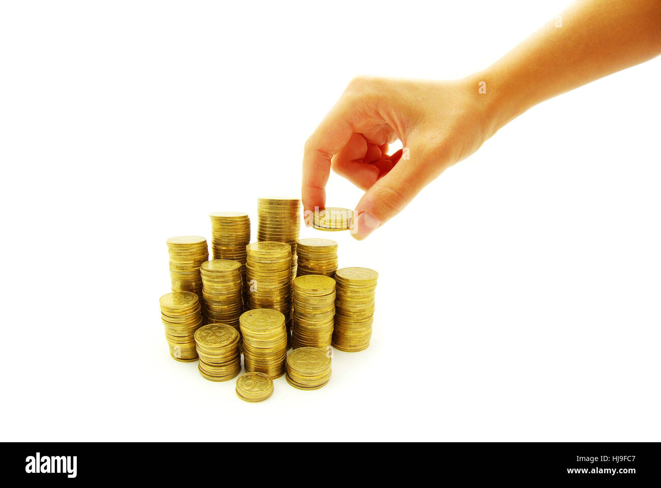 Hand put coin to money staircase isolated on white background Stock ...