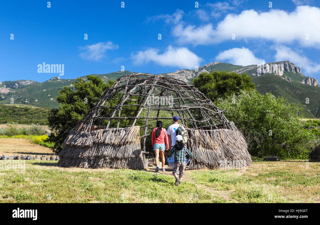 Visitors approach Chumash dwelling reconstructed at Rancho Sierra Vista ...