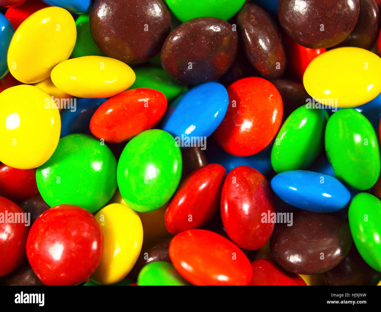 Multicolored candy pieces Stock Photo - Alamy