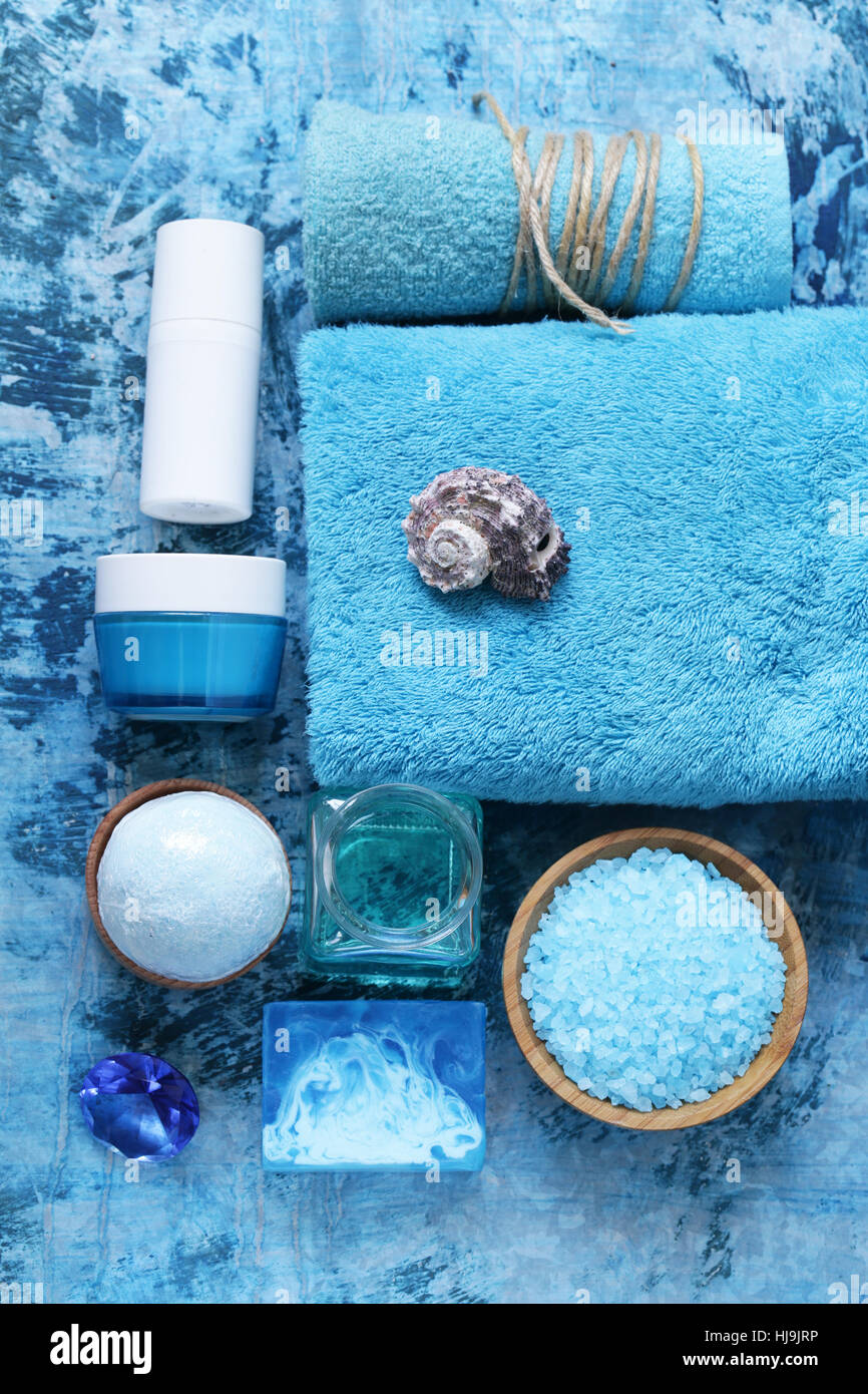 Spa concept turquoise - soap, salt, cream, towel Stock Photo - Alamy