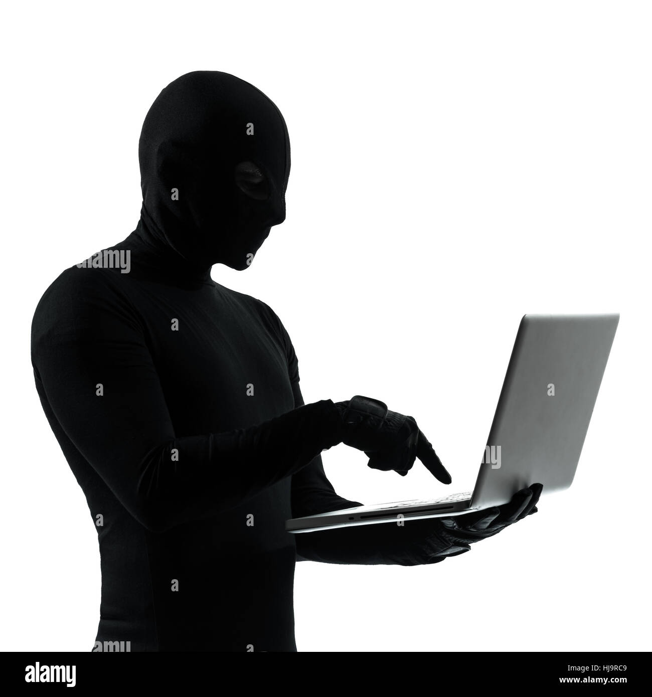 thief criminal computer hacker in silhouette studio isolated on white ...