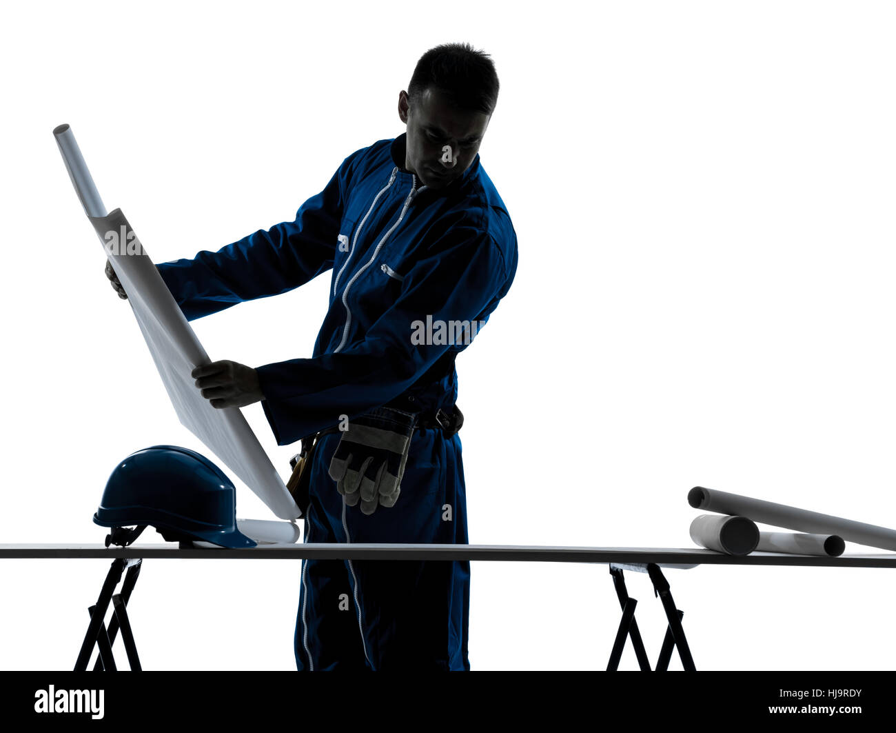 one caucasian man construction Architect working plans silhouette in ...