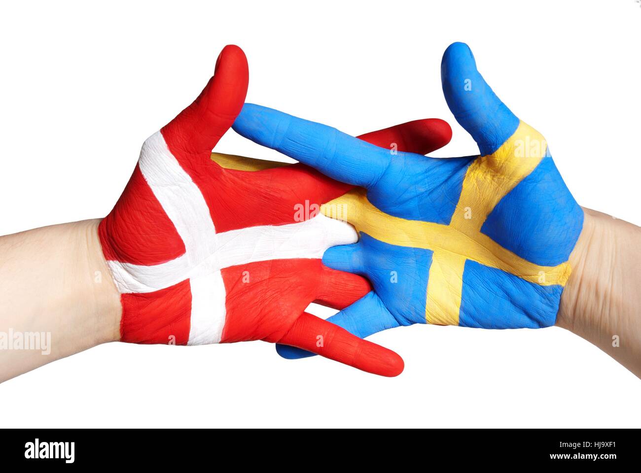 two painted hands handshaking in red, blue, white and yellow Stock ...