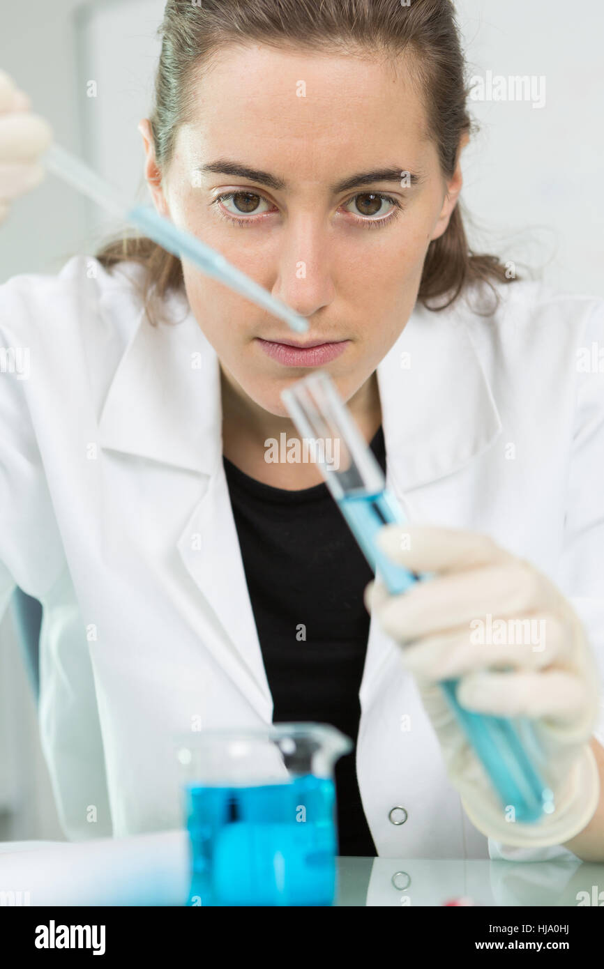 young student with test tube Stock Photo - Alamy