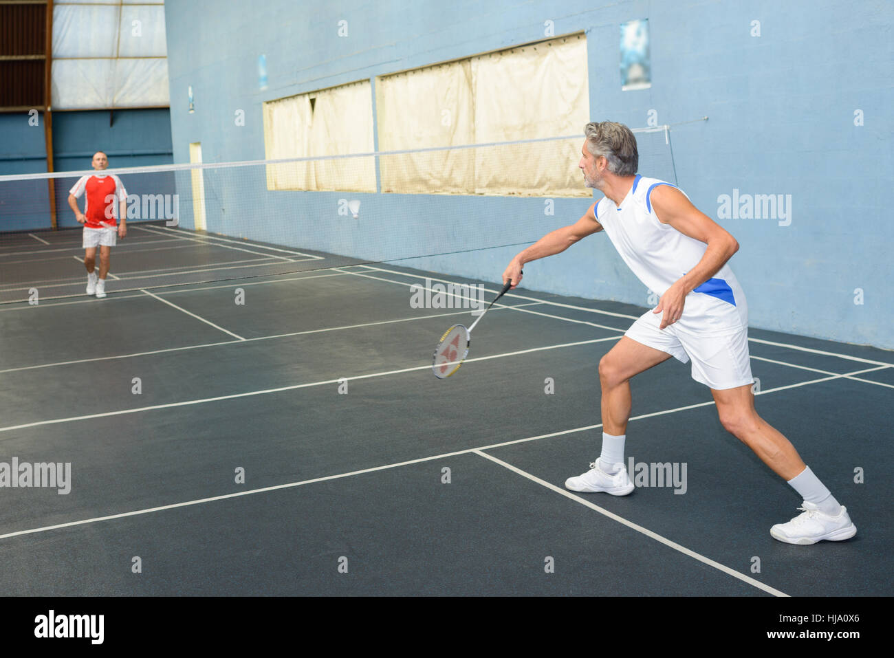 men playing badminton Stock Photo - Alamy