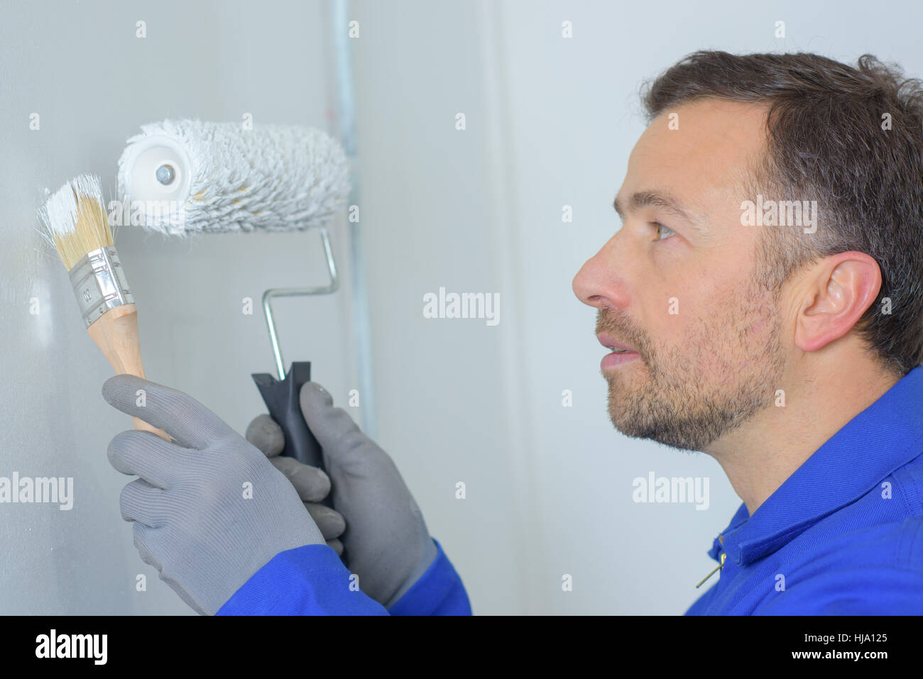 Painter at work Stock Photo - Alamy