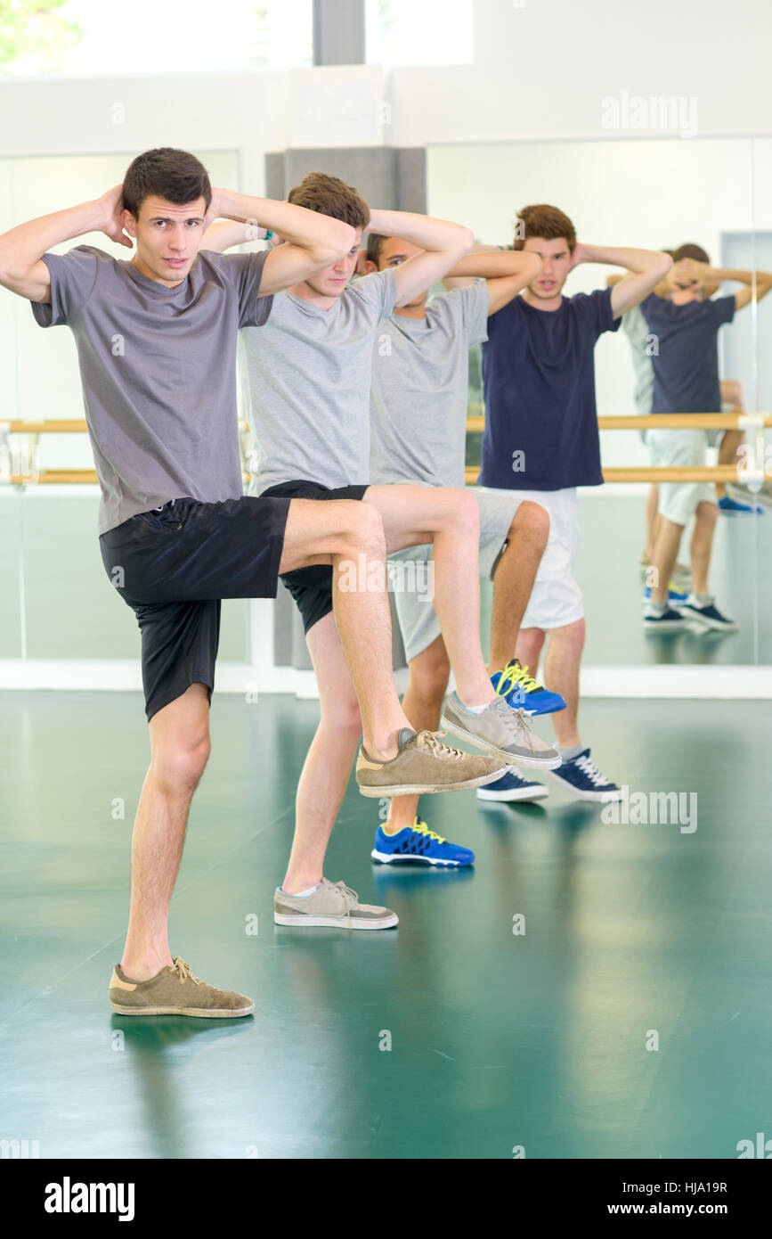 Young men exercising Stock Photo - Alamy