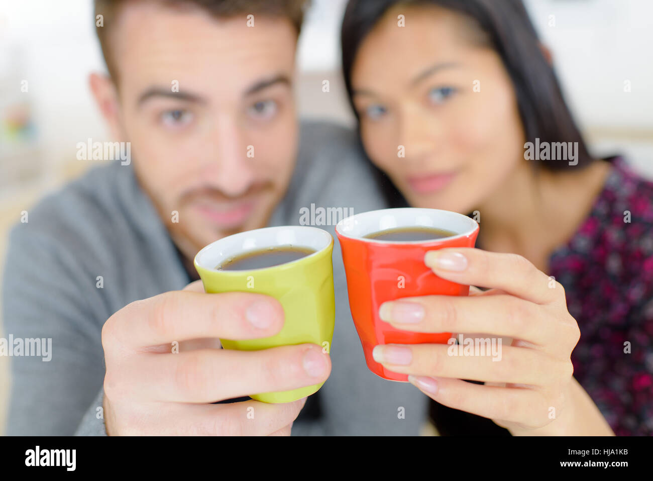 Couple drinking coffee Stock Photo - Alamy