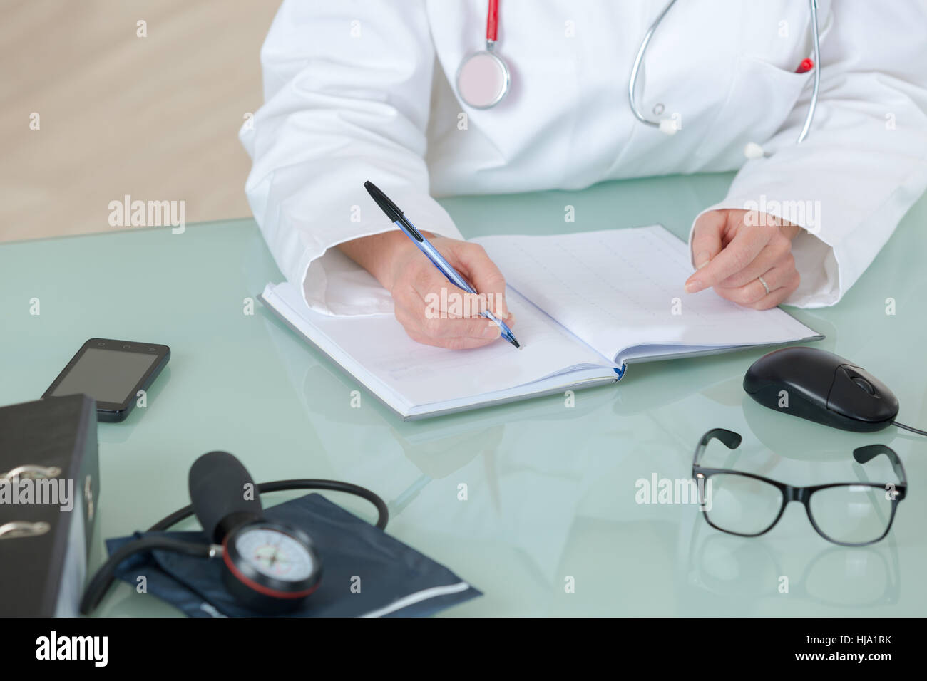nurse with notebook and computer Stock Photo - Alamy