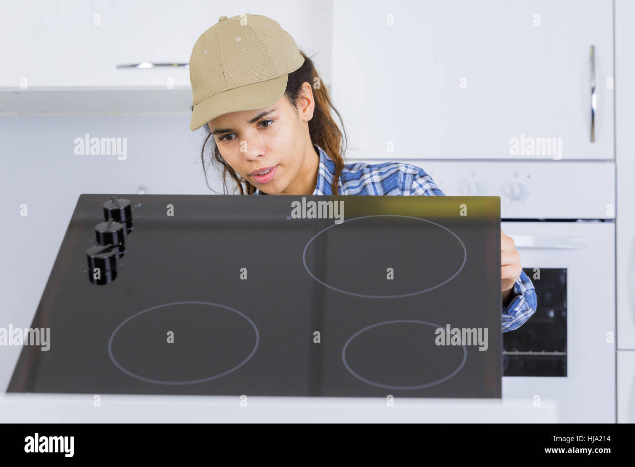 checking the hob Stock Photo - Alamy