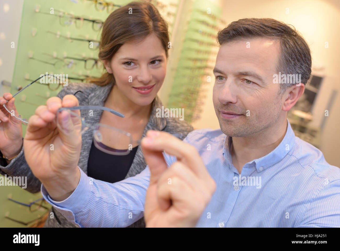 checking the new eyeglasses Stock Photo - Alamy