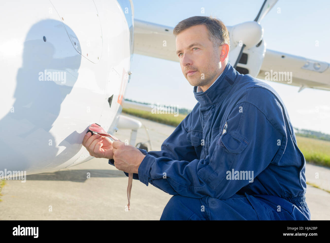 inspecting the aircraft Stock Photo - Alamy