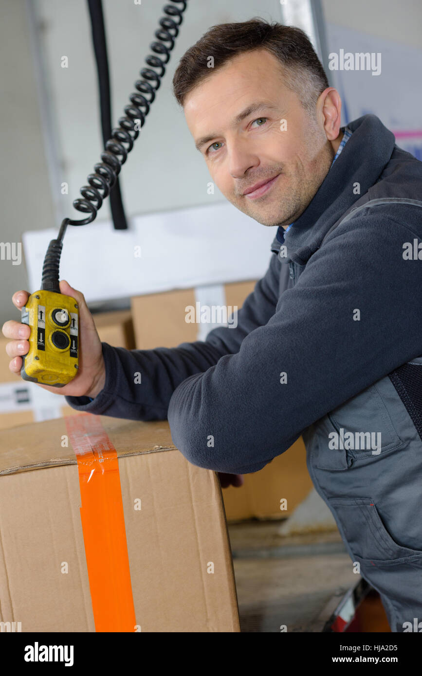 delivery man with parcel near cargo truck shipping service Stock Photo ...