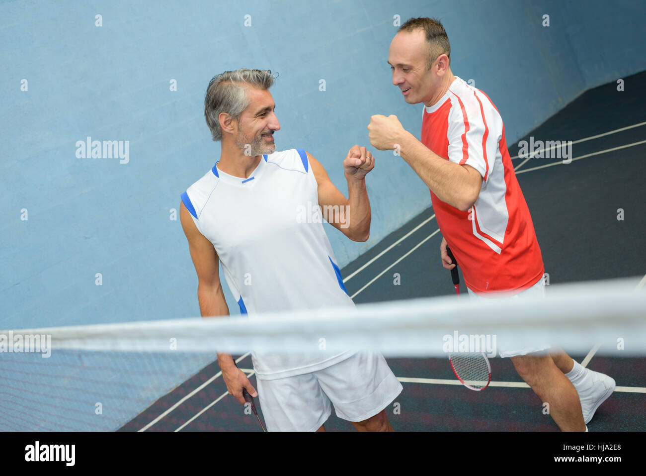 men playing badminton Stock Photo - Alamy
