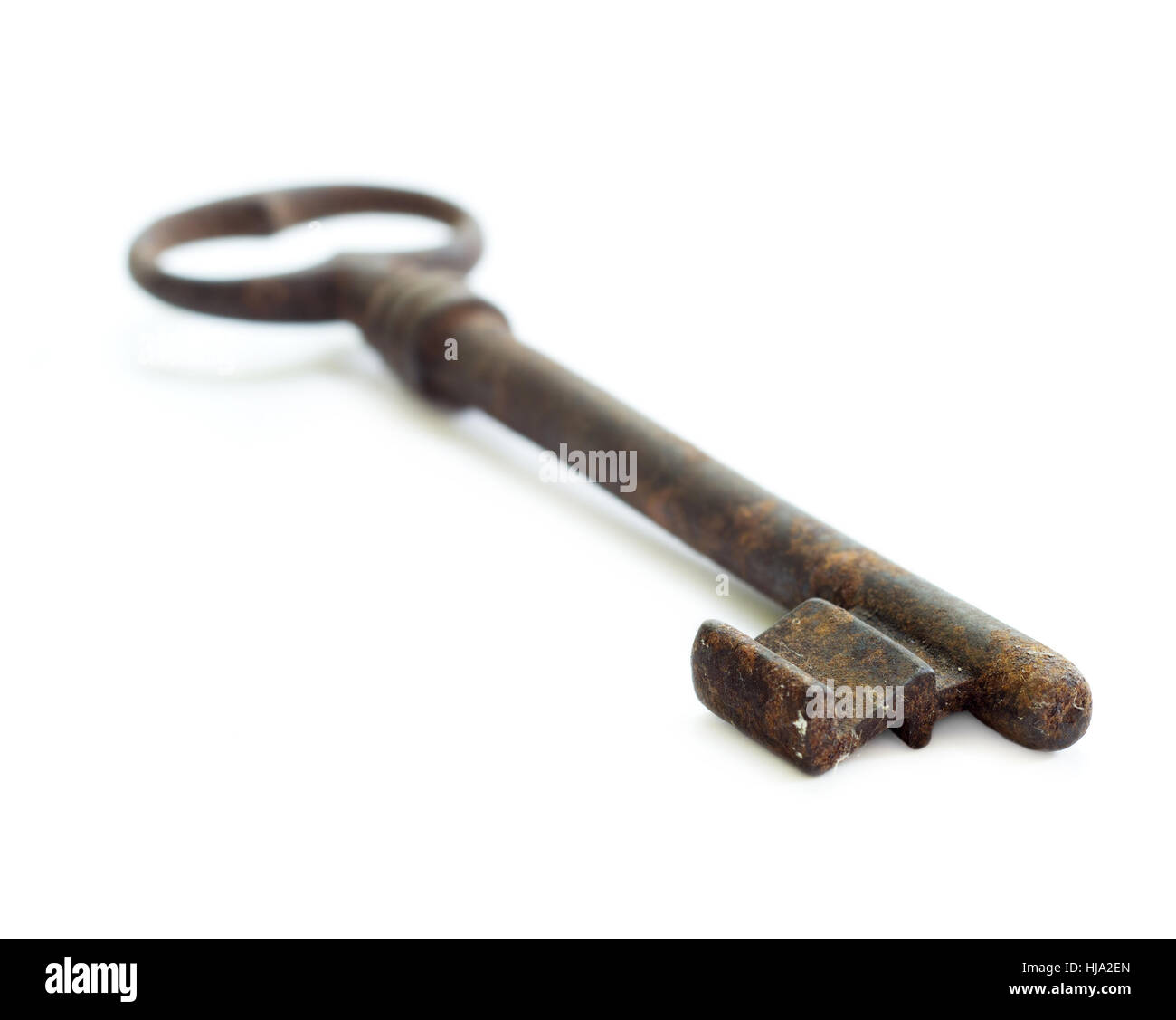 close up of antique iron key on white background Stock Photo - Alamy