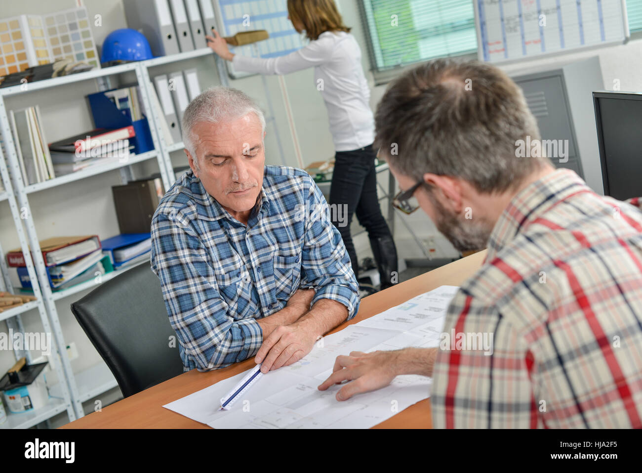 Architect with a colleague Stock Photo - Alamy