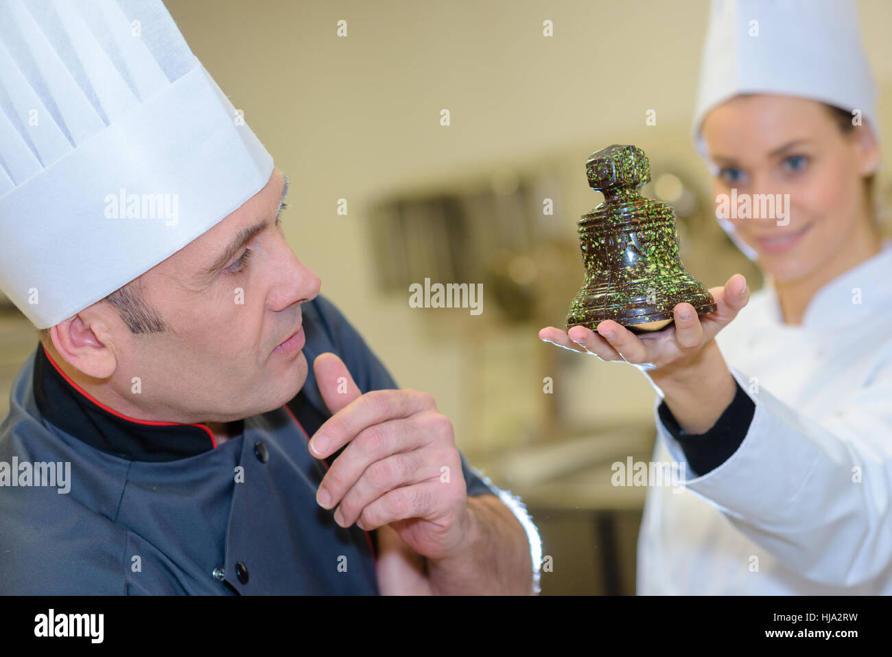 chef team in restaurant kitchen with dessert working together Stock ...