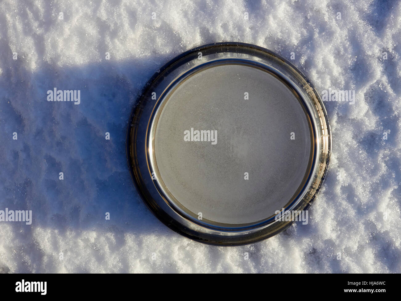 frozen bowl of water Stock Photo - Alamy