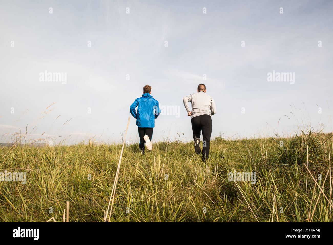 Back view young sportsman running hi-res stock photography and images ...