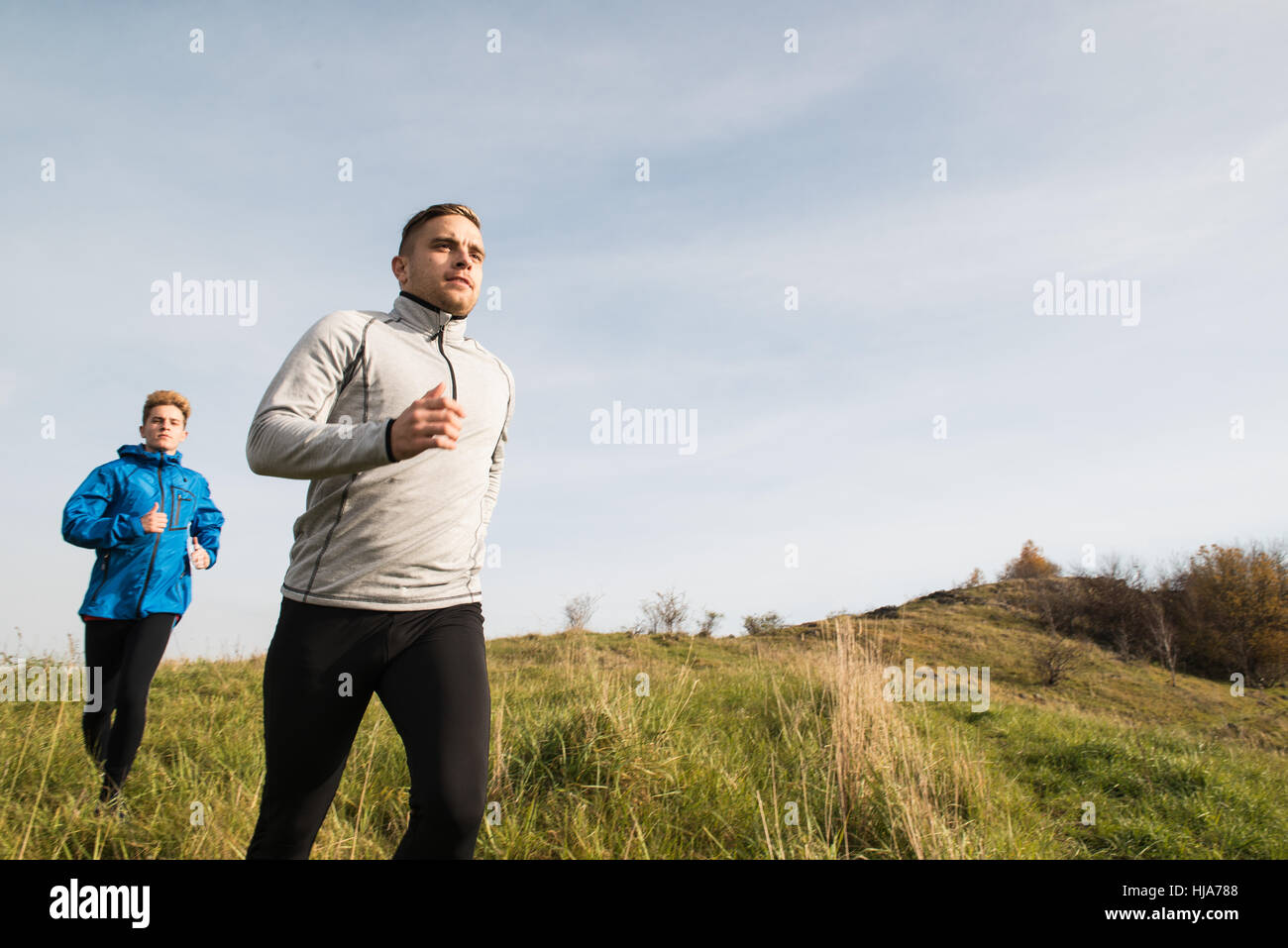 Two running man training hi-res stock photography and images - Alamy