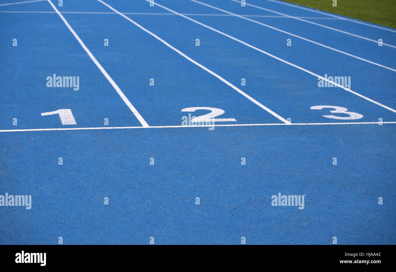 lanes of a blue athletic track with numbers one two and three Stock ...