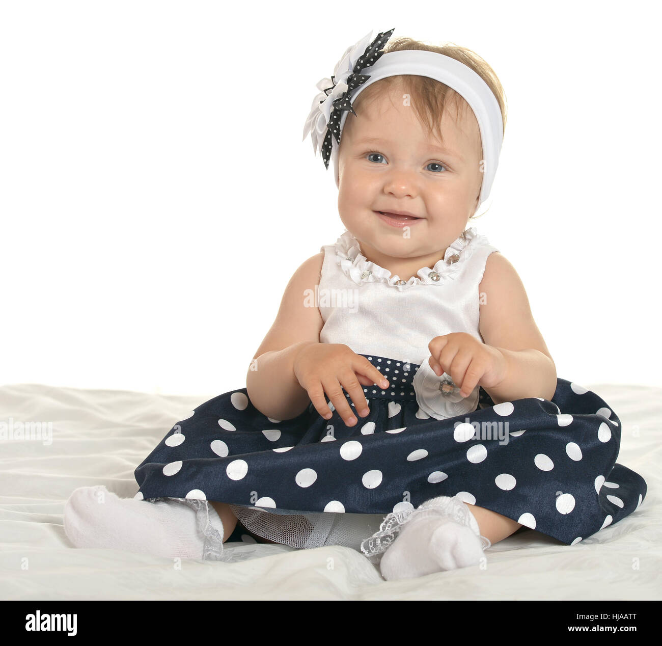 Beautiful baby in cute dress Stock Photo - Alamy