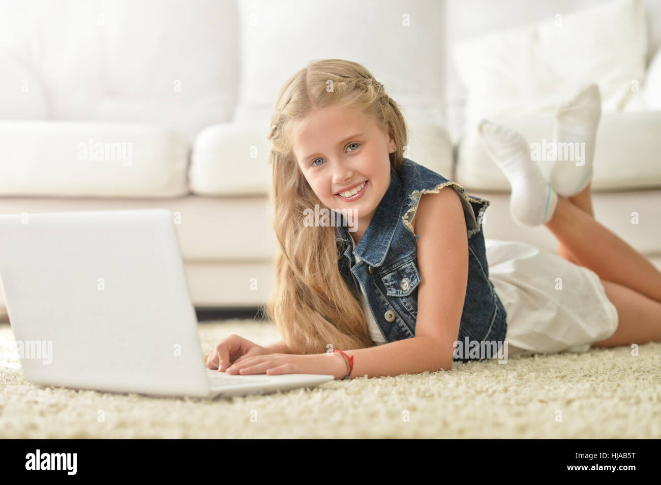 cute little girl using laptop Stock Photo - Alamy