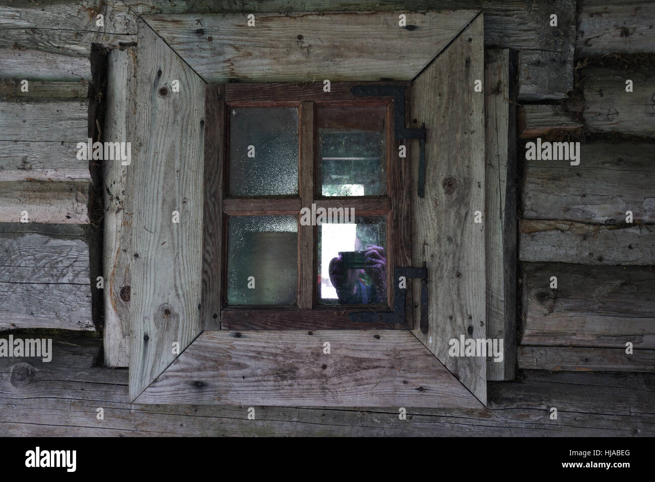 Old window of a wooden building Stock Photo - Alamy