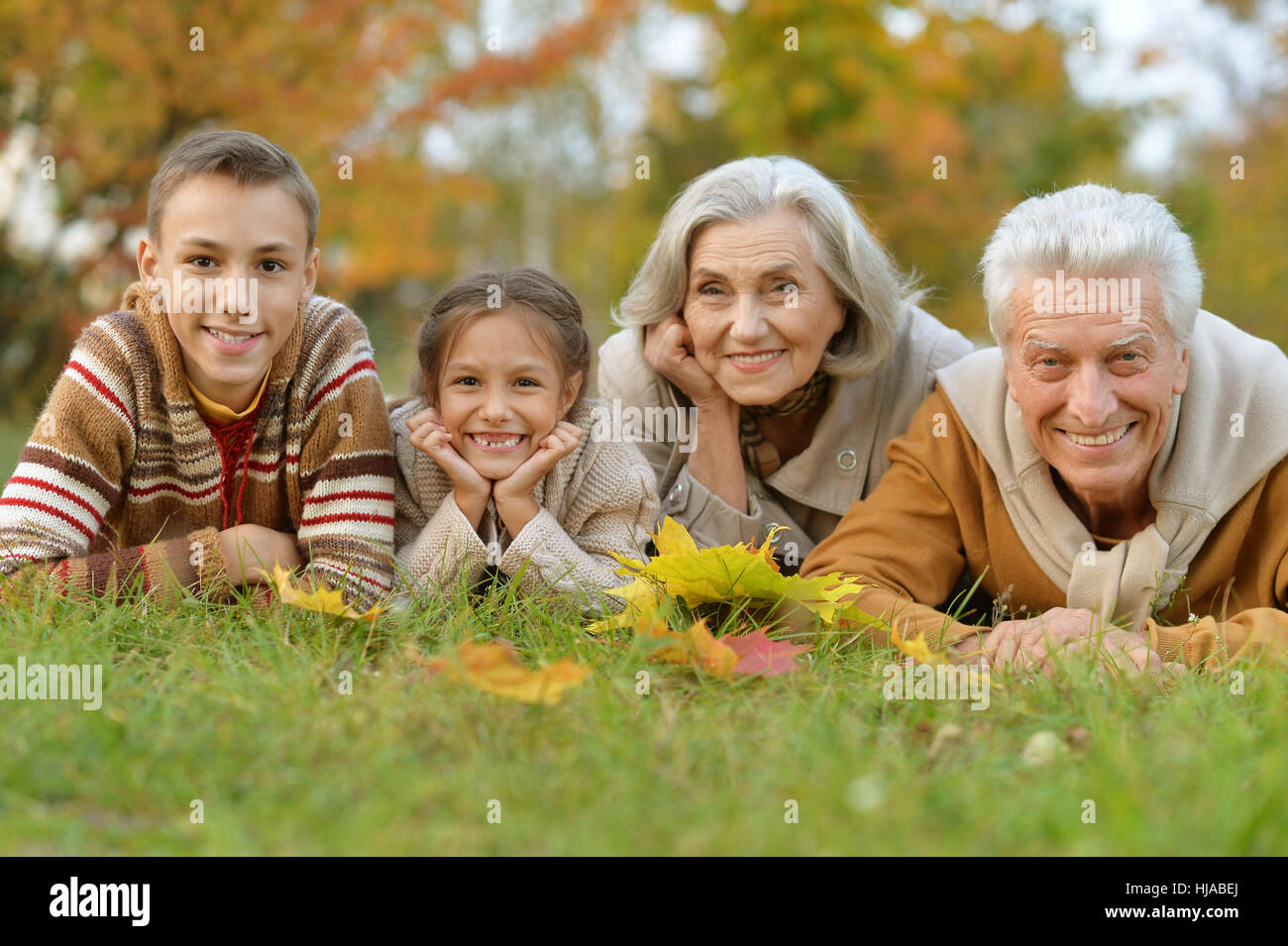 grandchildren with their grandparents Stock Photo - Alamy