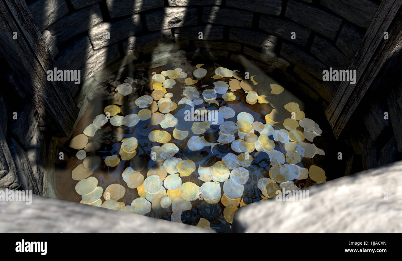 A top view looking over the edge into a brick wishing well with gold ...