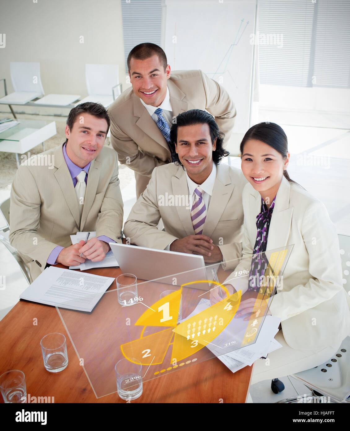 Overview of happy colleagues using yellow pie chart interface in a ...