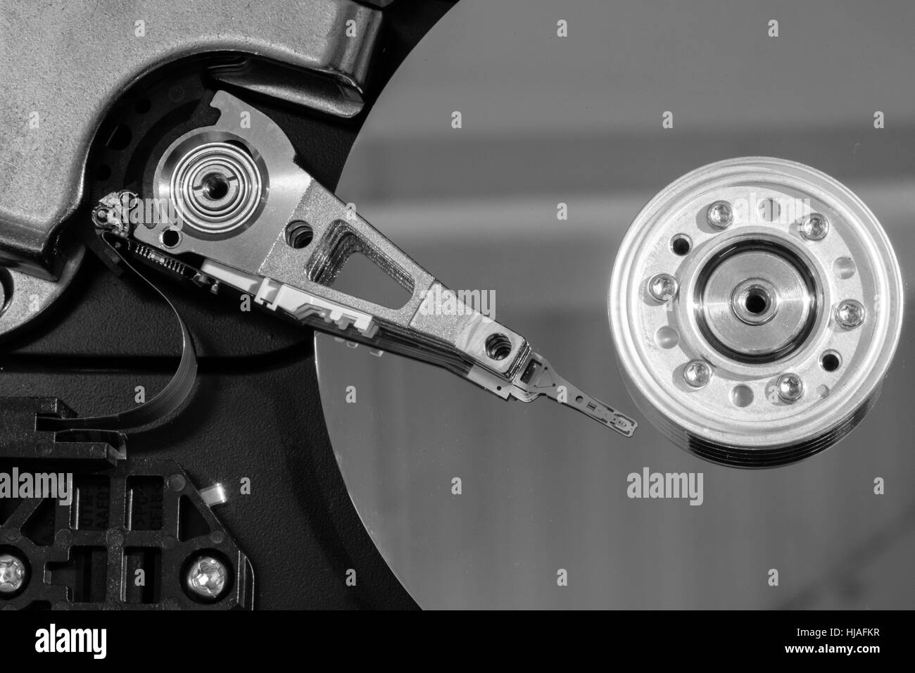 Close up of a spindle of disk drive in black and white Stock Photo - Alamy